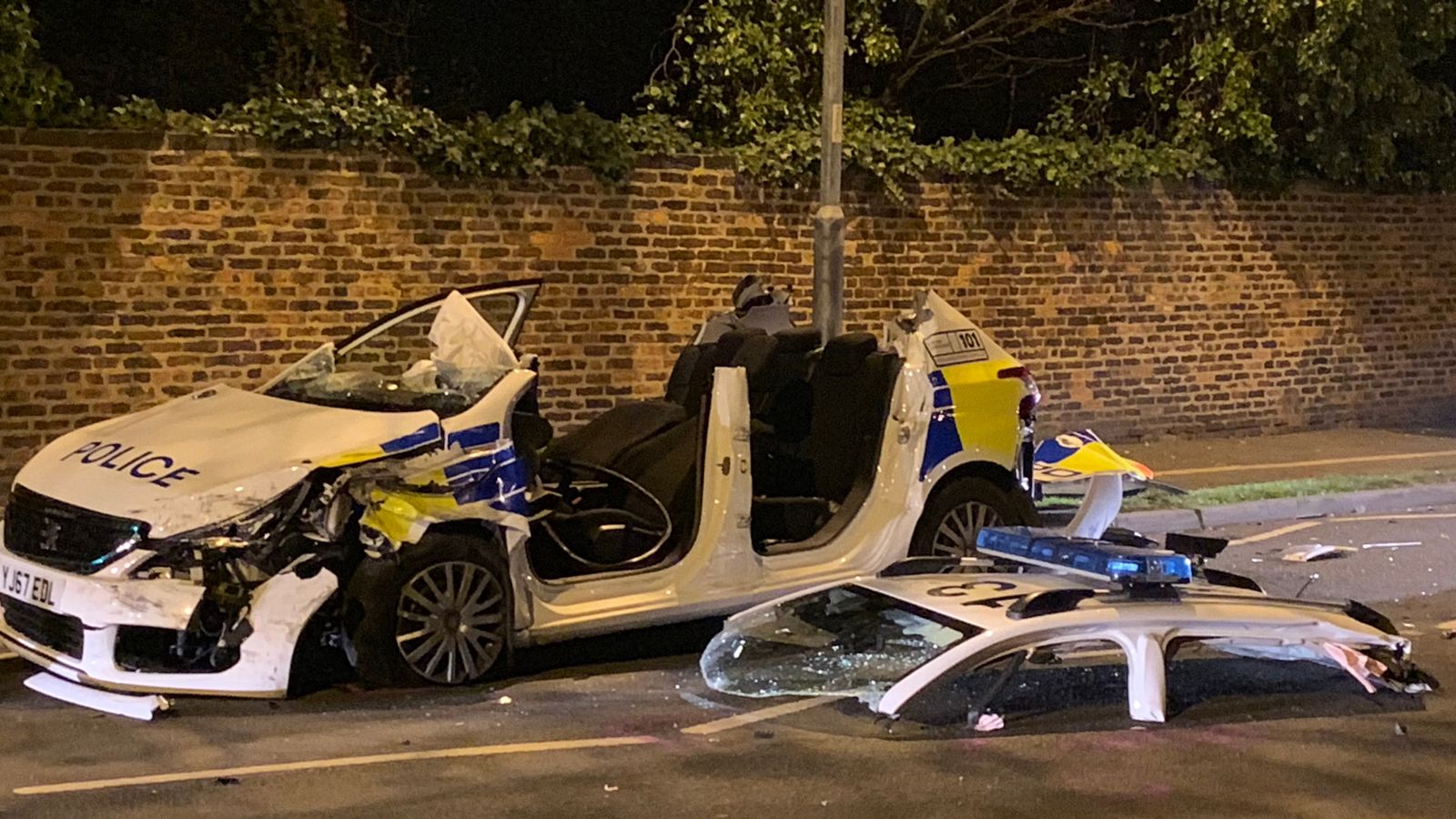 Two people in hospital after collision involving police car | UK News ...