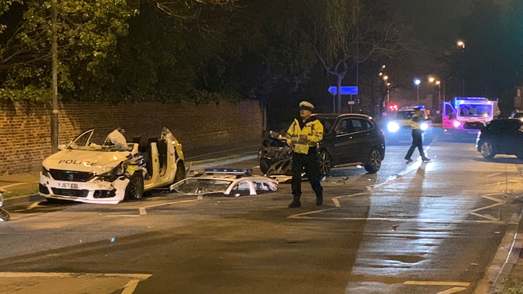 Two people in hospital after collision involving police car | UK News ...