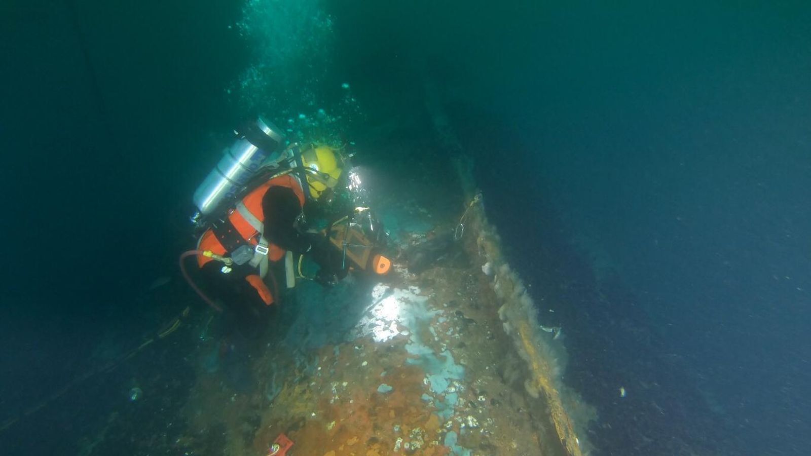 Efforts to plug oil leak in British WWII tanker torpedoed by U-boat off ...