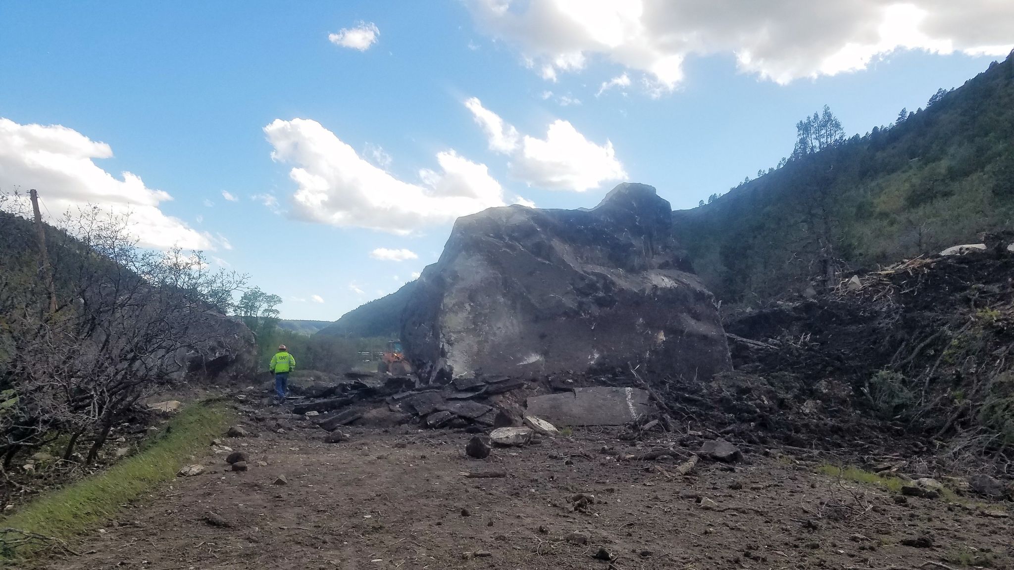 Huge rock size of a building makes 8ft crater in road | UK News | Sky News