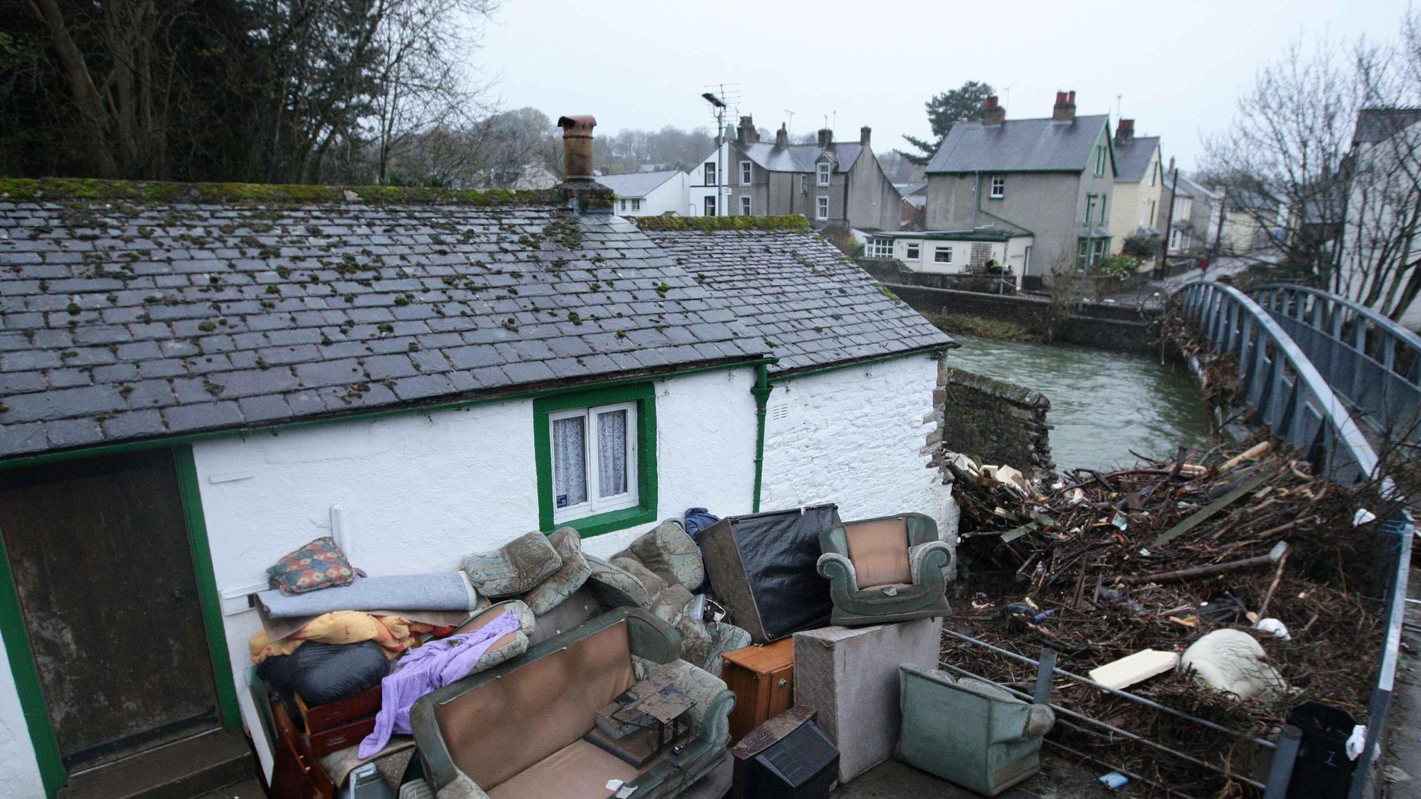 Flood threat may force whole communities to abandon homes, report warns ...