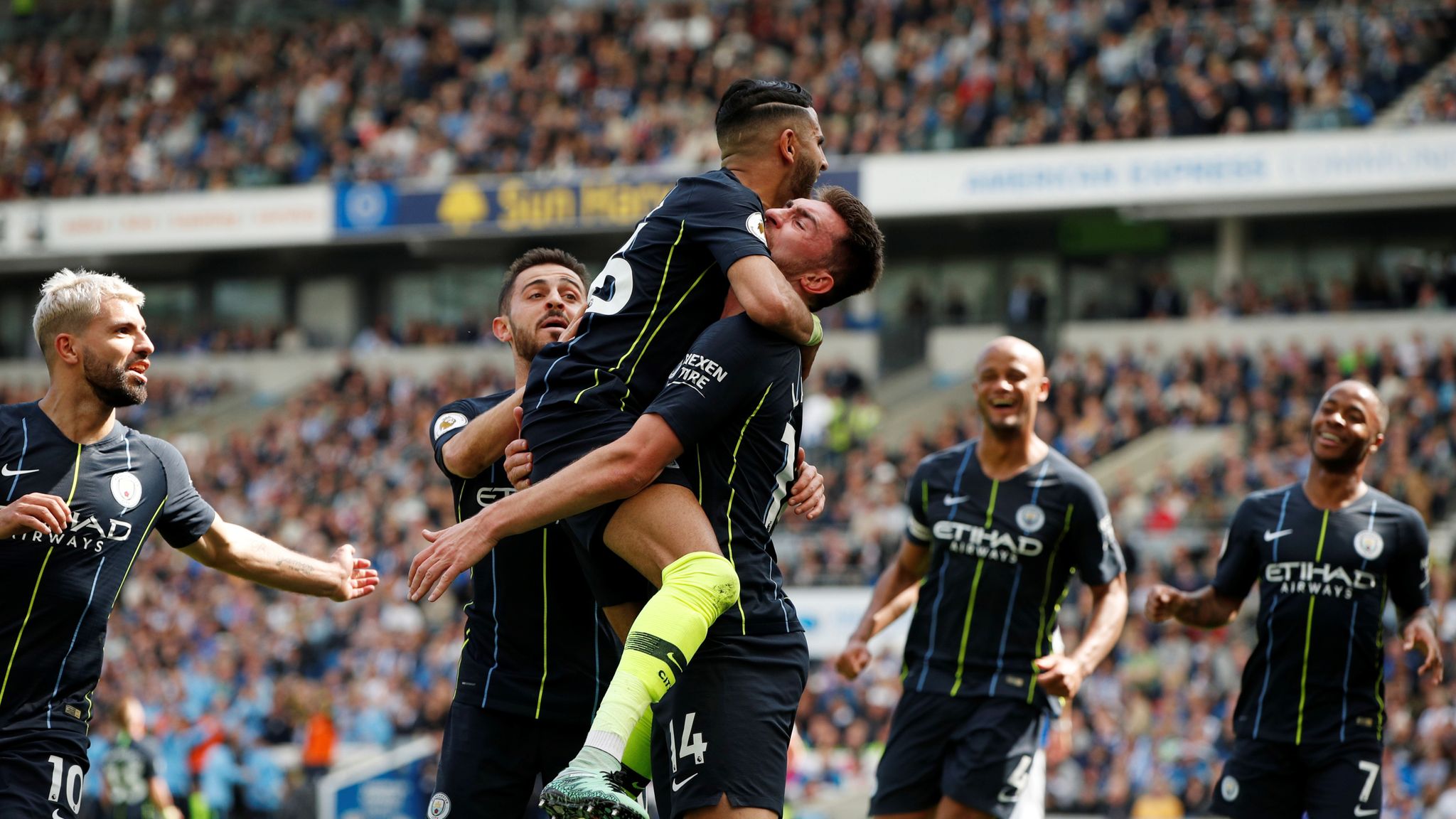 Manchester City return to heroes welcome after winning Premier League ...