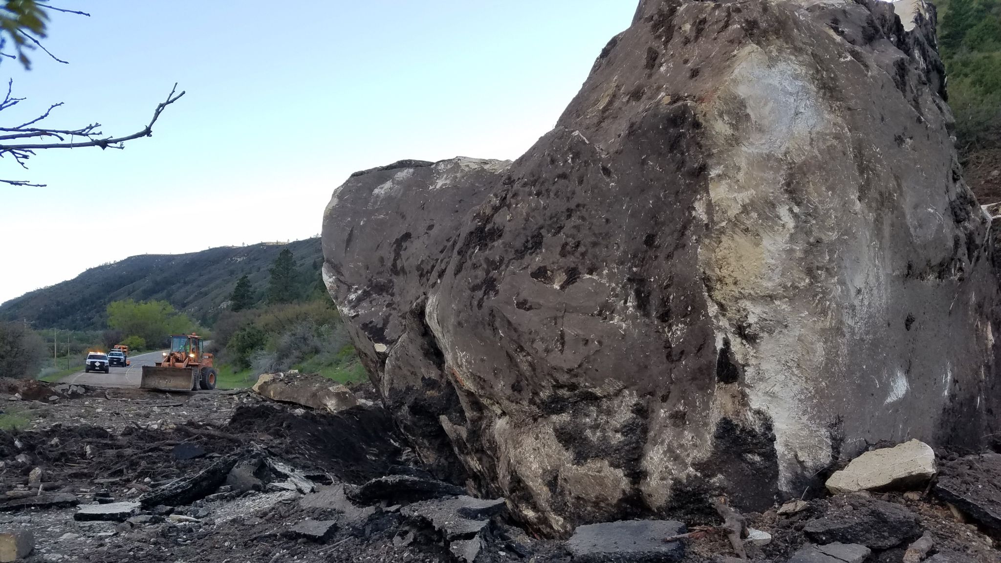 Huge rock size of a building makes 8ft crater in road | UK News | Sky News
