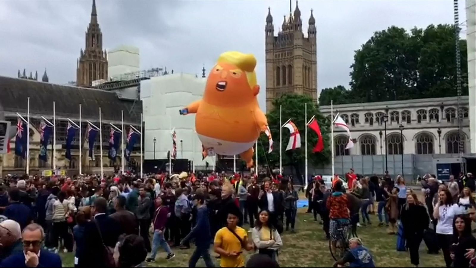 Real Trump drives past blimp Trump | Trump News | Sky News