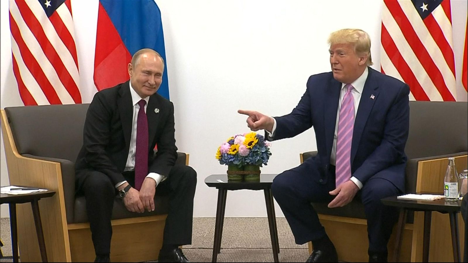 Trump asks a smirking Putin 'not to meddle' | World News | Sky News