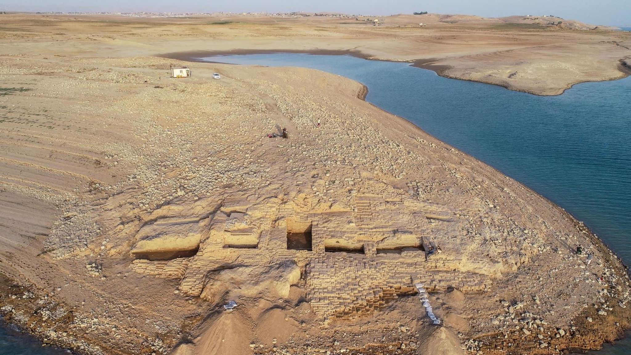 Ancient palace emerges from Iraqi reservoir after water levels fall ...
