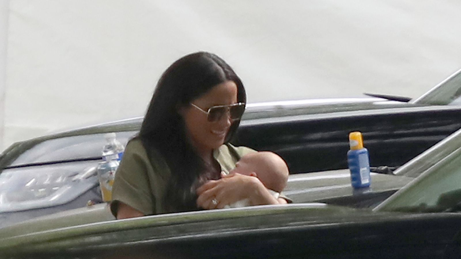 Meghan cradles Archie alongside Kate during first public appearance at ...