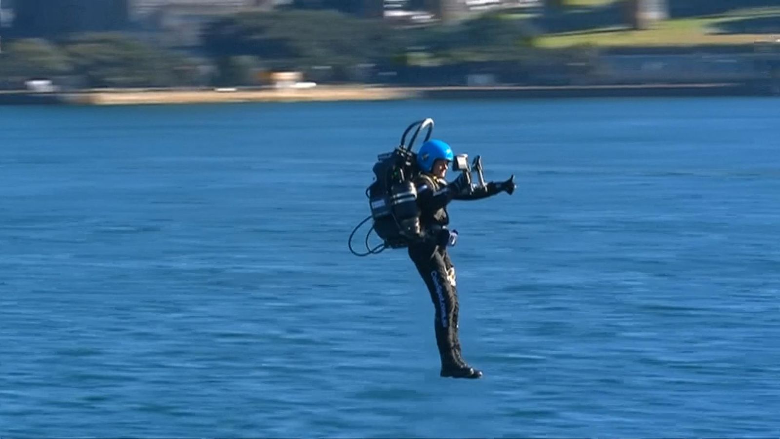 Man with jetpack flies by Sydney Opera House | Science, Climate & Tech ...