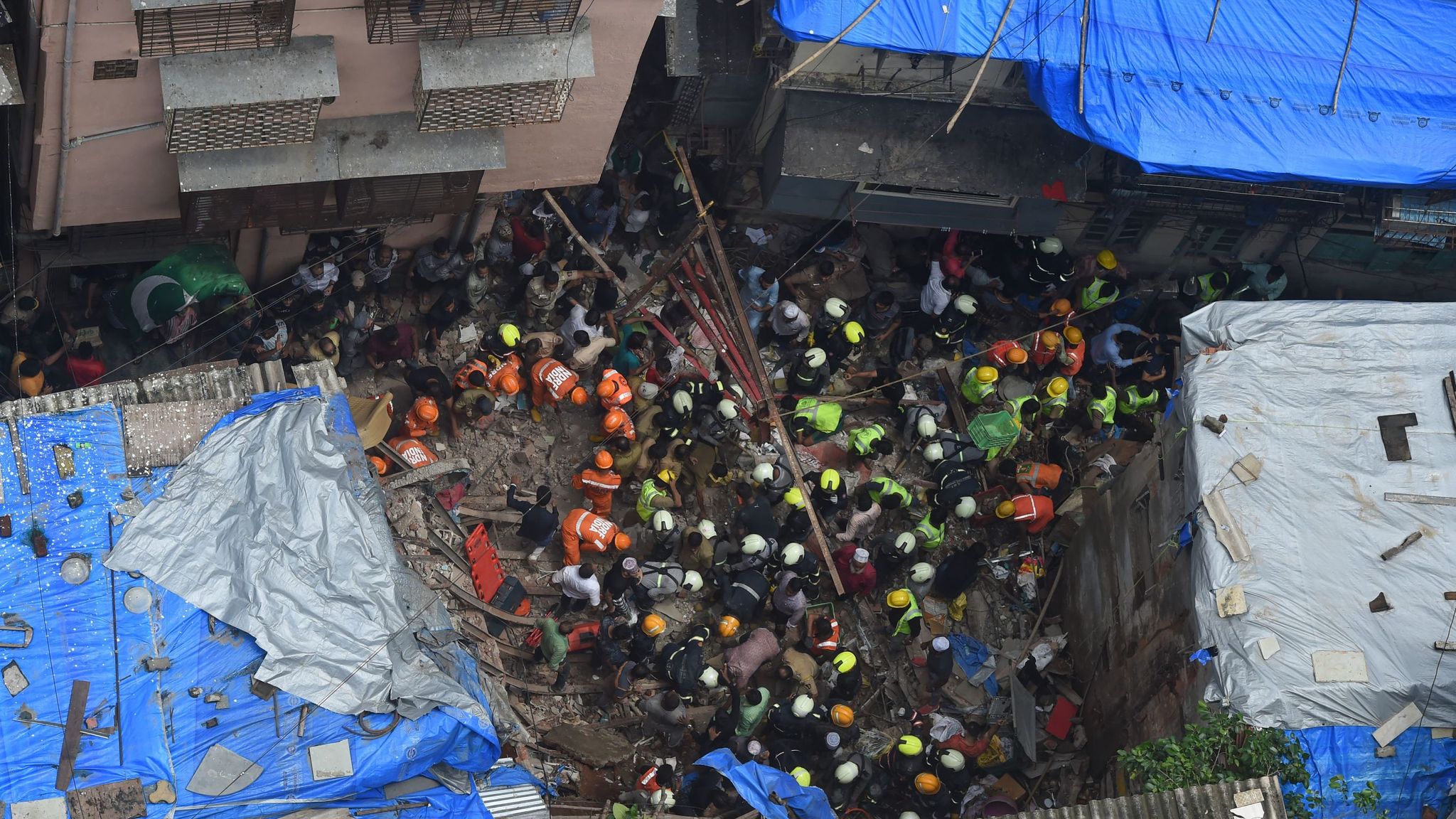 Mumbai building collapse: Four dead and more than 30 feared trapped | World News | Sky News
