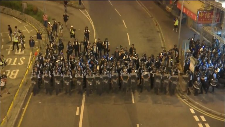 Hong Kong unrest: Riot police line up during latest protests in Chinese ...