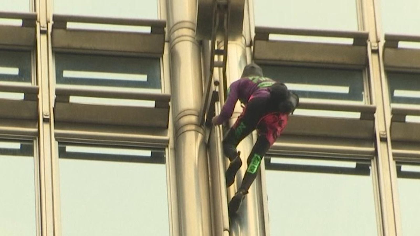'Spiderman' Alain Robert climbs Hong Kong skyscraper | World News | Sky ...