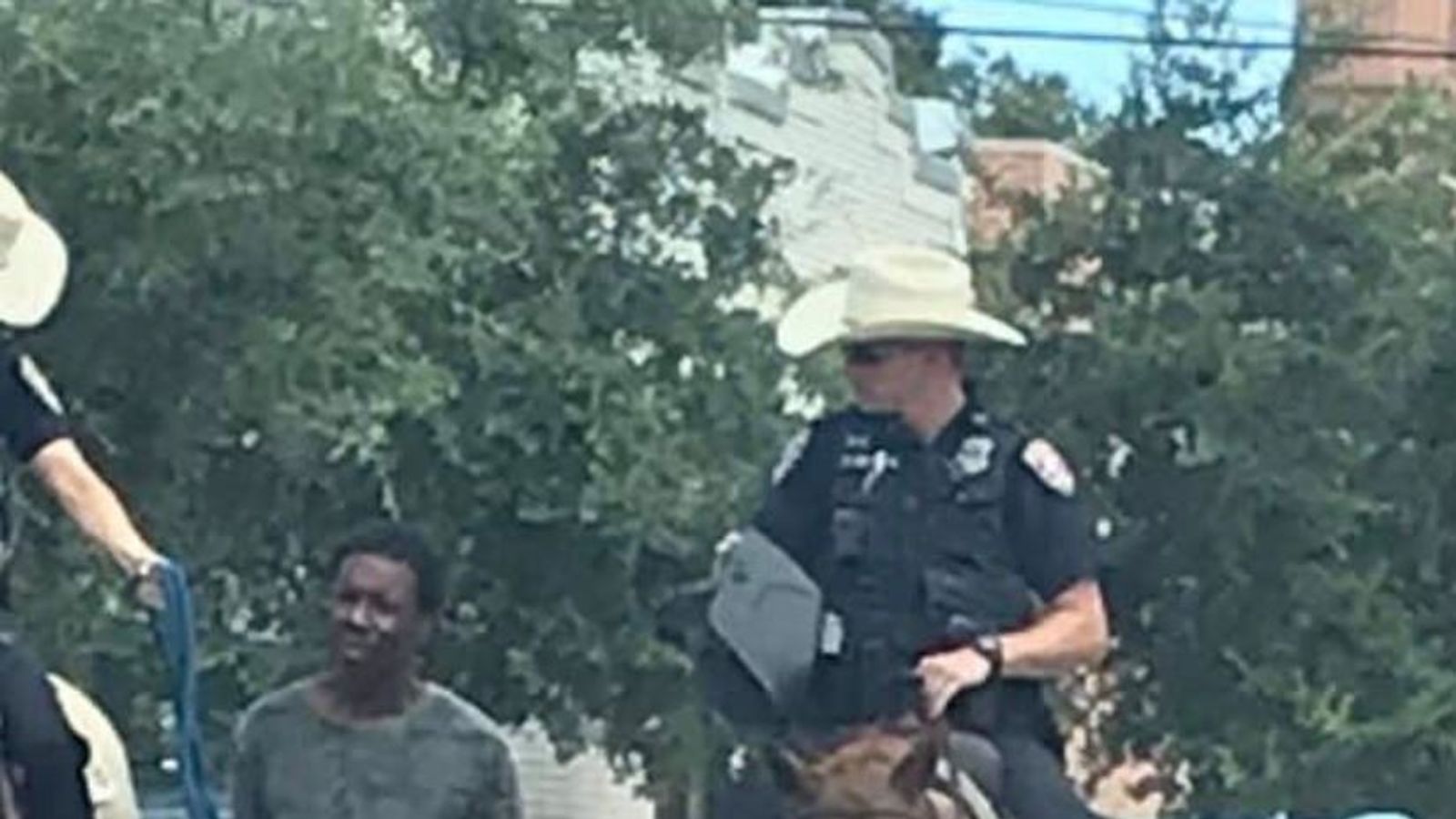 Texas police apologise after horseback officers lead black suspect by a ...