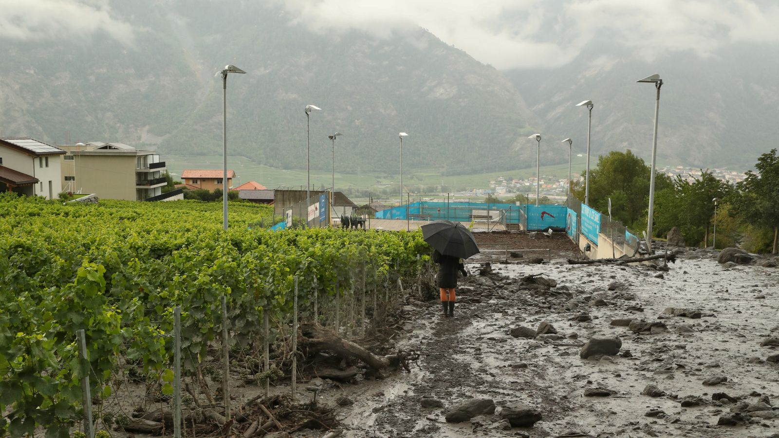 Violent mudslide rushes down Swiss river | World News | Sky News