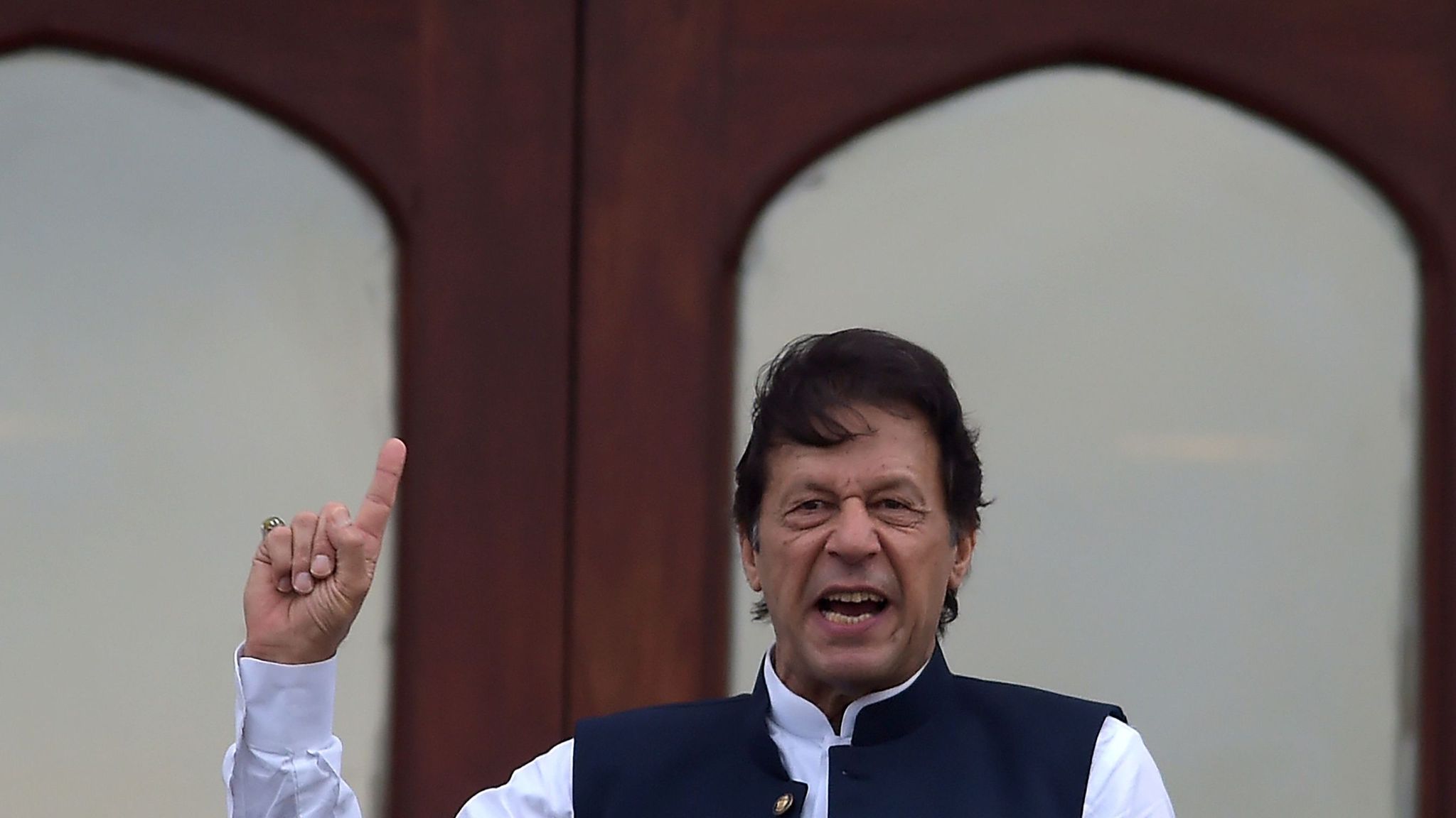 Imran Khan: Pakistan PM vows 'befitting' response if India attacks Pakistan-administered Kashmir ...