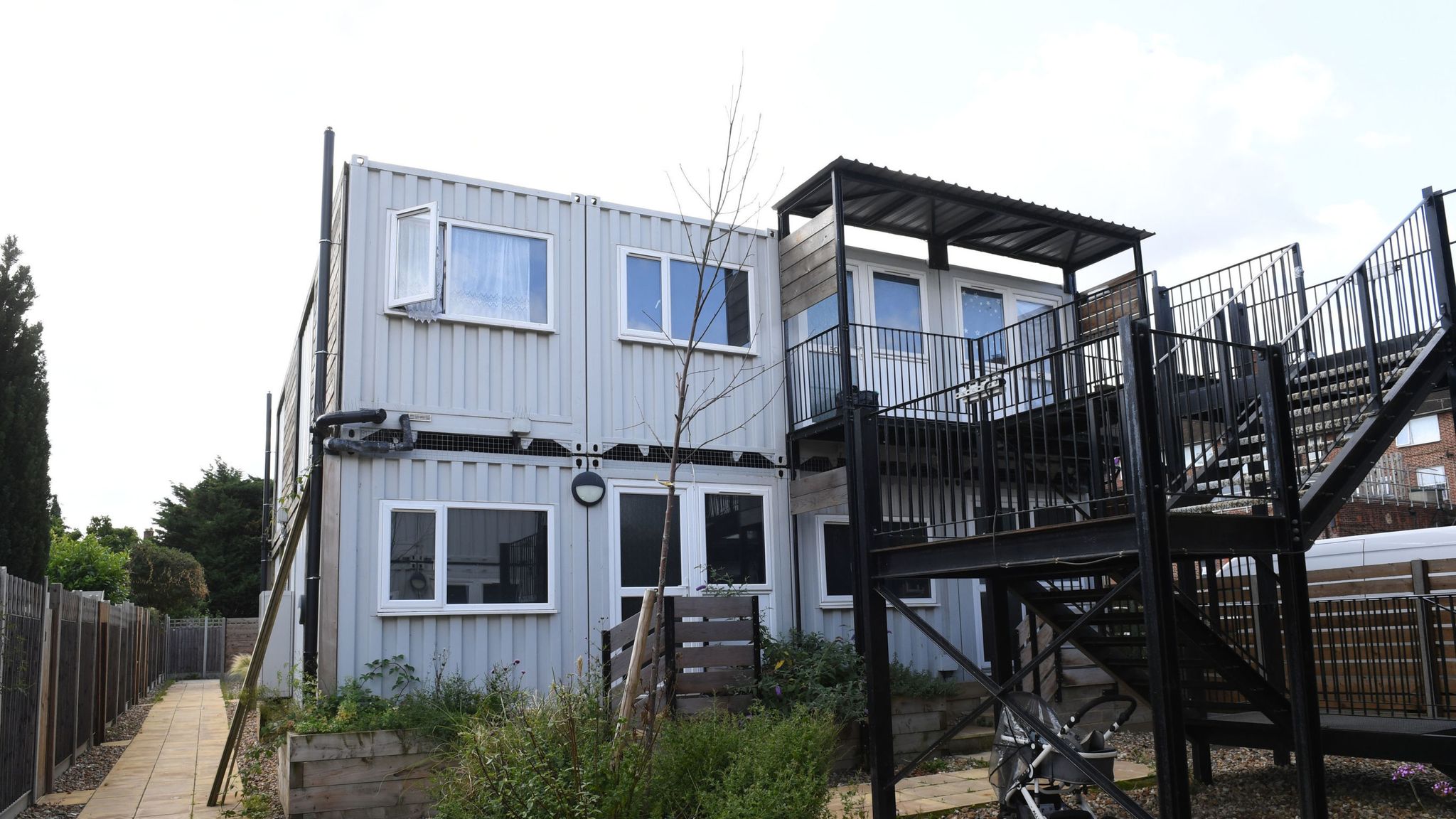 Shipping container flat is like a prison for me and my four kids | UK ...