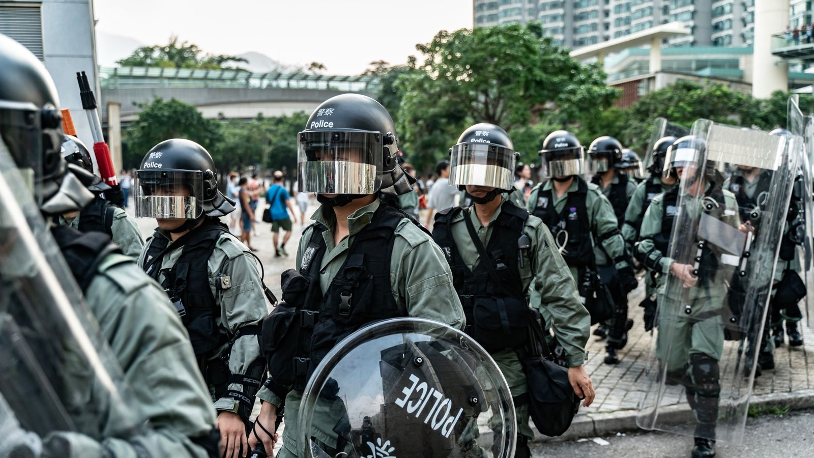 Hong Kong protests: Police fire tear gas in busy shopping district ...