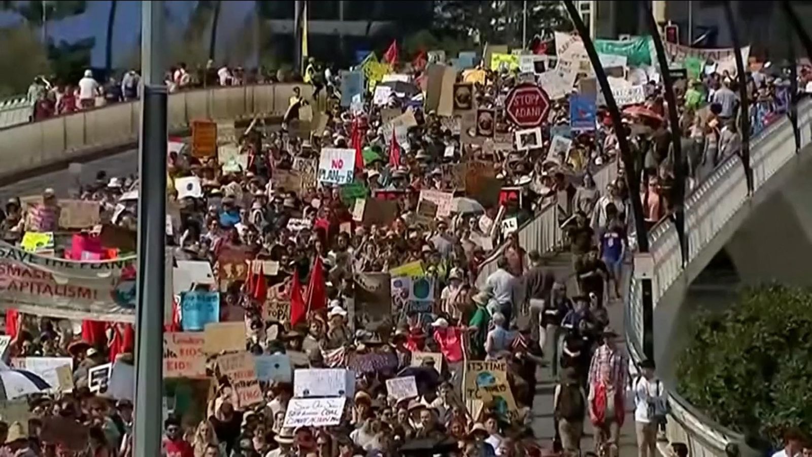'We will never back down' on climate change, say protesters around the ...