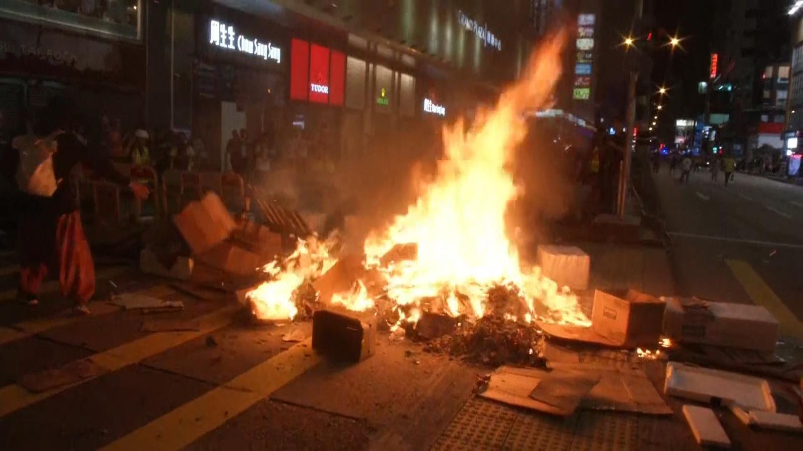 Protesters start fire in latest clashes | World News | Sky News