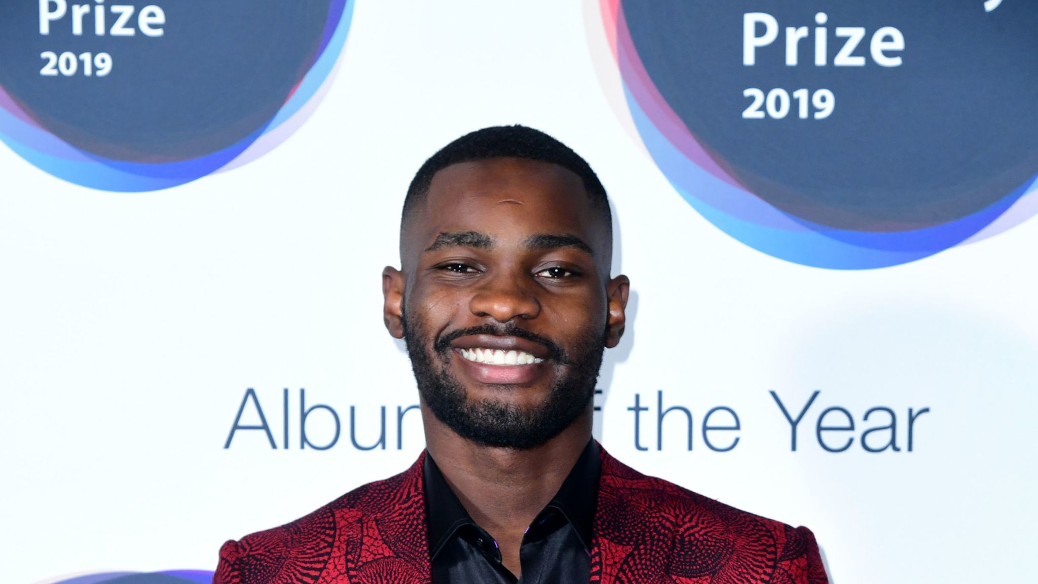 Dave wins Mercury Prize as fellow rapper slowthai holds up fake Boris ...