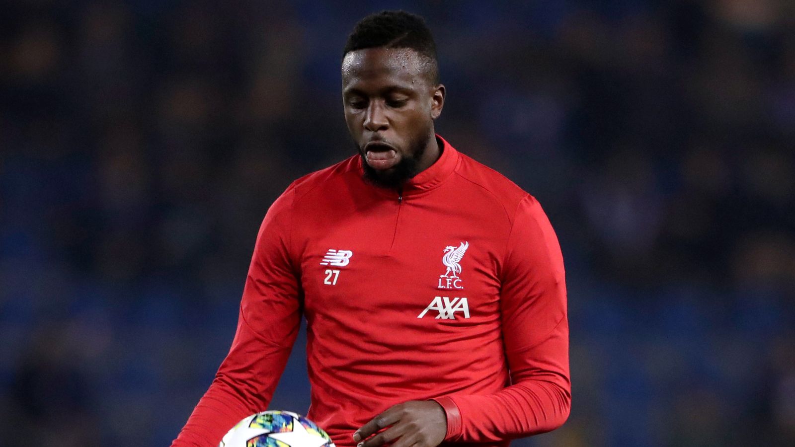 Liverpool condemn fans over 'racist' Divock Origi poster | World News ...