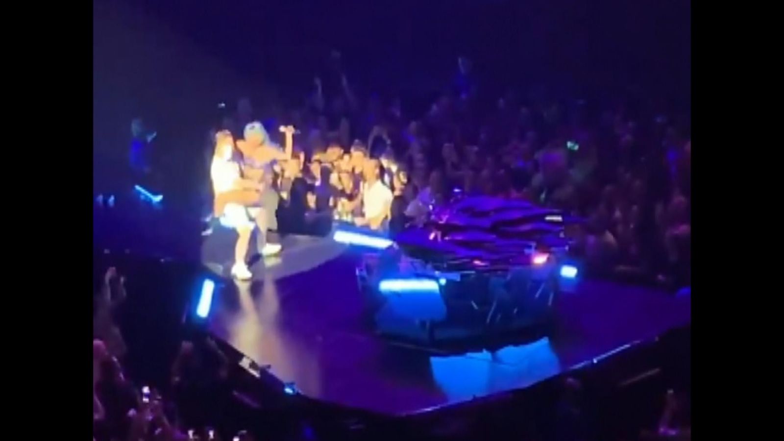 Lady Gaga falls off stage in fan's arms | Ents & Arts News | Sky News