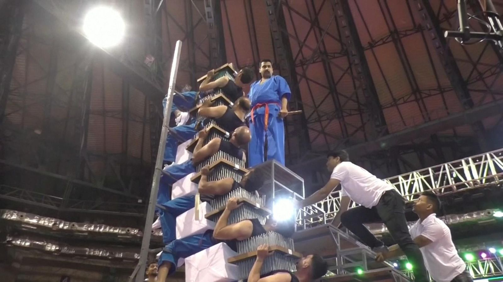 India: Daredevils set new record for most layers in bed of nails ...
