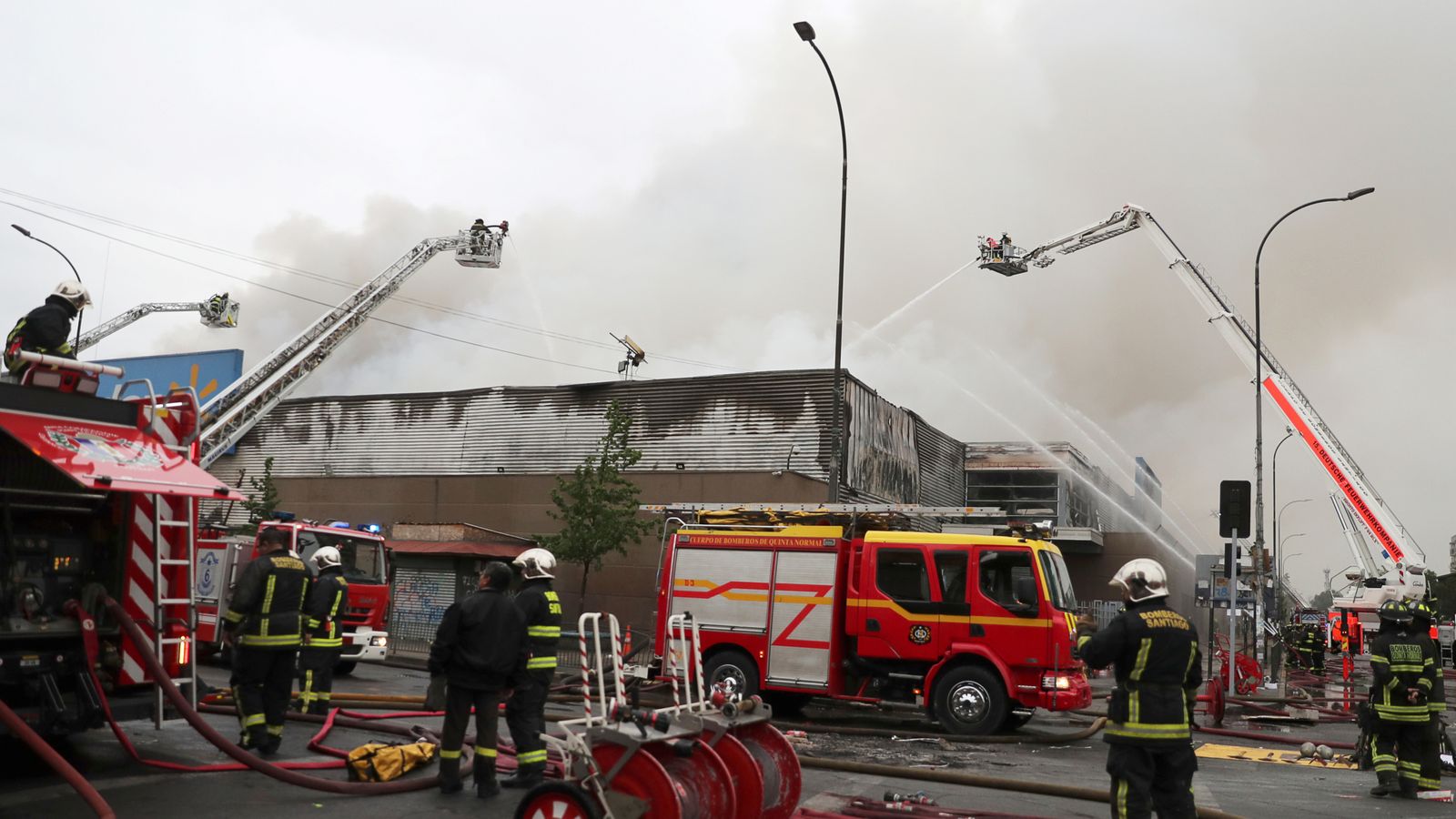 Three die in supermarket fire as Chile hit by violent protests ...