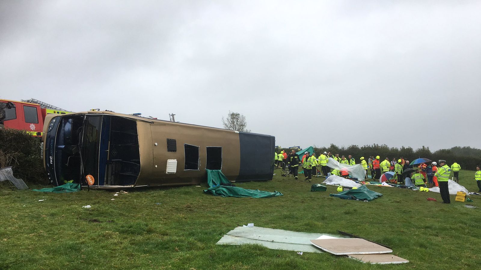 Dozens injured after double-decker bus overturns into field near Totnes ...