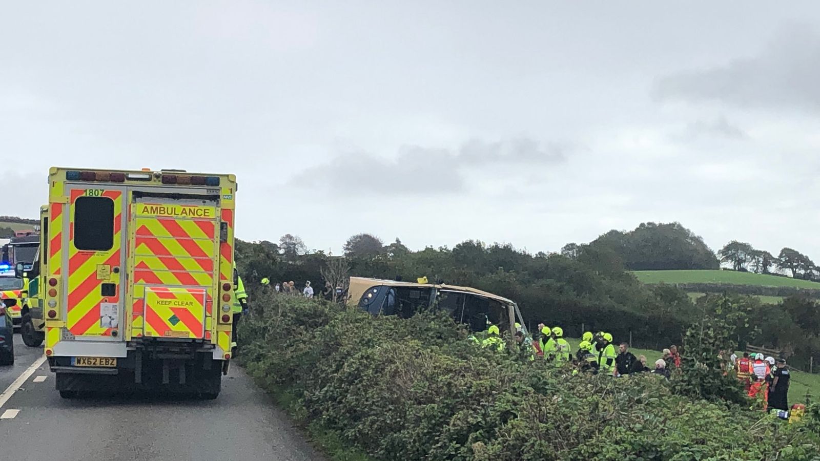 Dozens injured after double-decker bus overturns into field near Totnes ...
