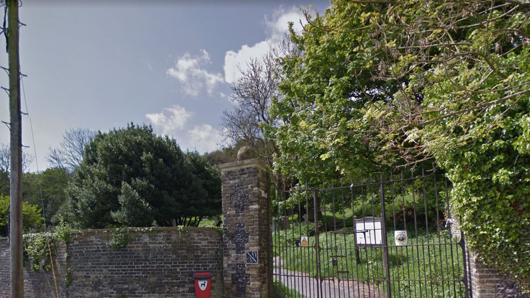 Two arrested on suspicion of murder after man found dead in cemetery ...