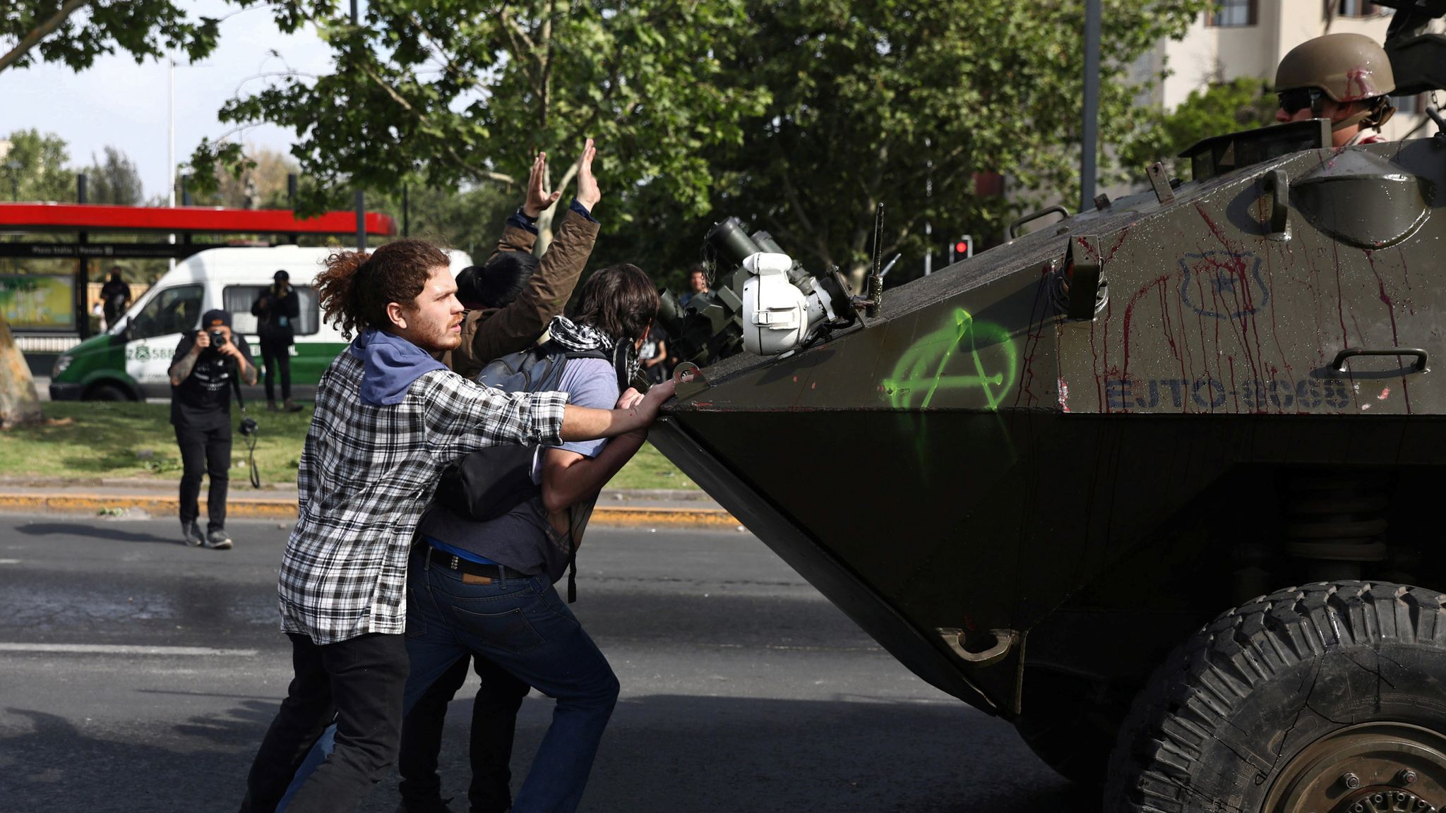 Three die in supermarket fire as Chile hit by violent protests ...