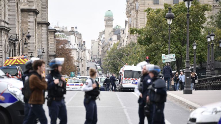 Police officer dies after knife attack at Paris police headquarters ...