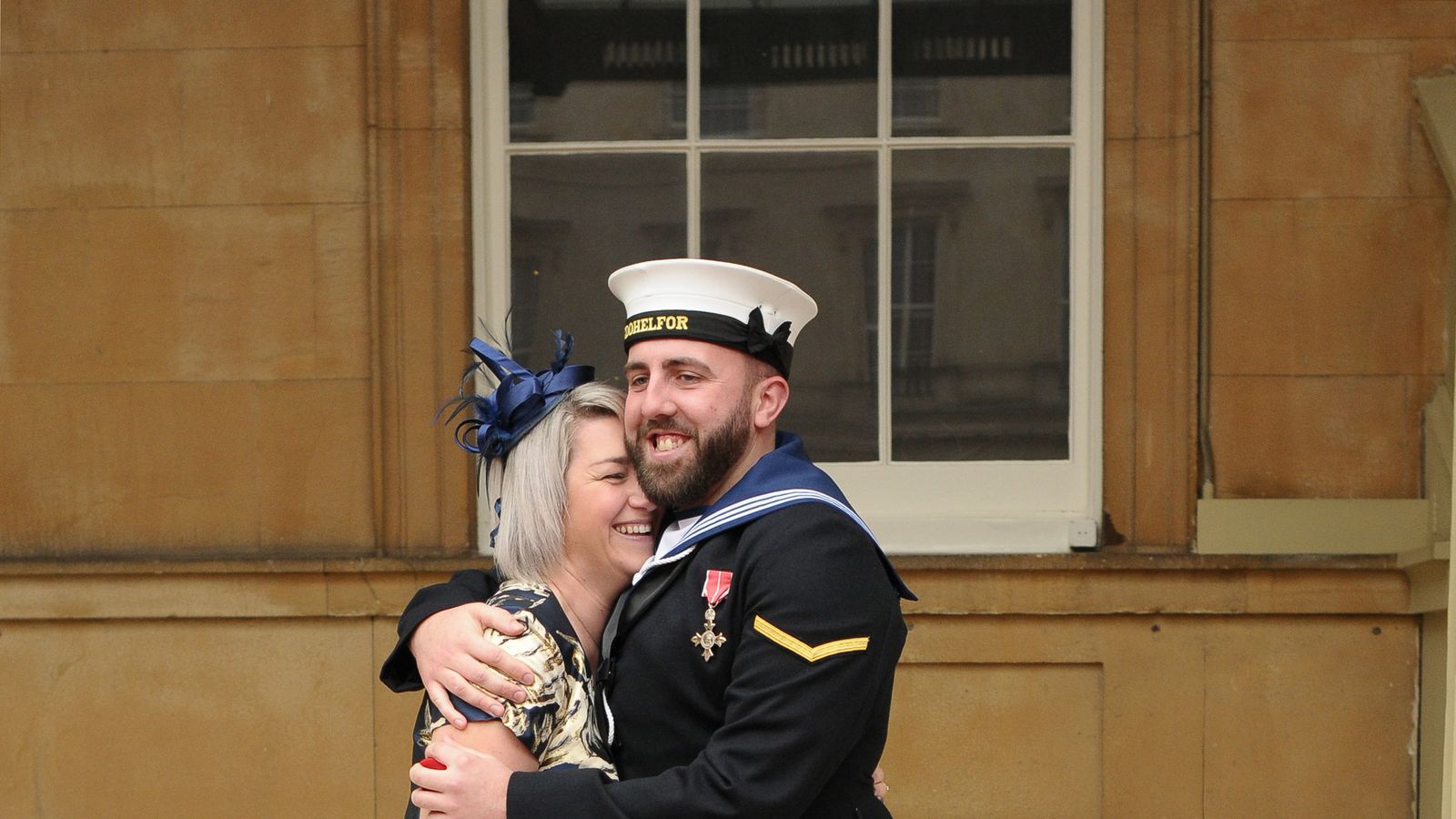 Naval engineer proposes to partner at Buckingham Palace after receiving ...