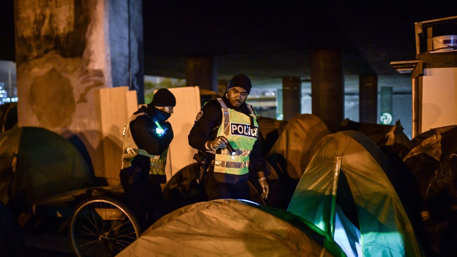 Police remove 1,600 migrants from camps under Paris flyovers | World News | Sky News