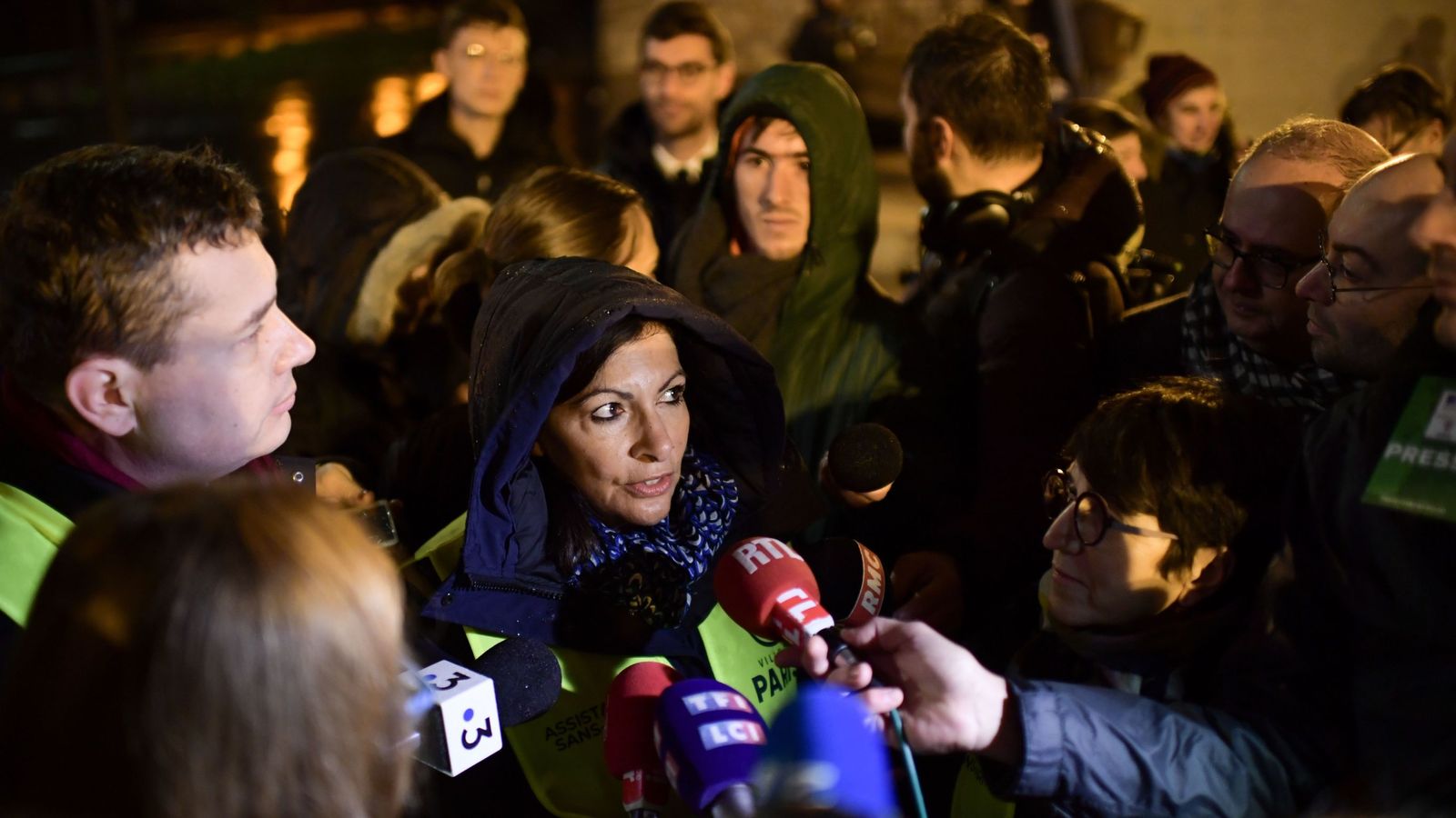 Police remove 1,600 migrants from camps under Paris flyovers | World News | Sky News