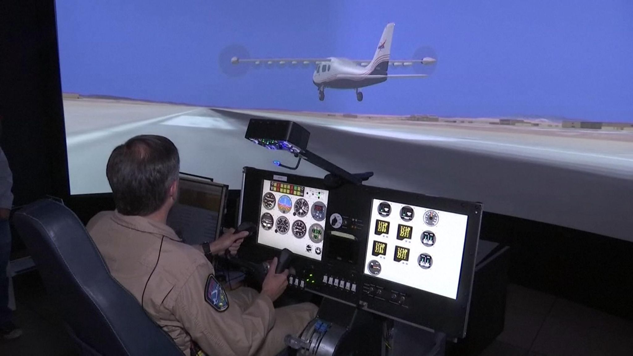 NASA unveils early version of all-electric plane | Science, Climate ...