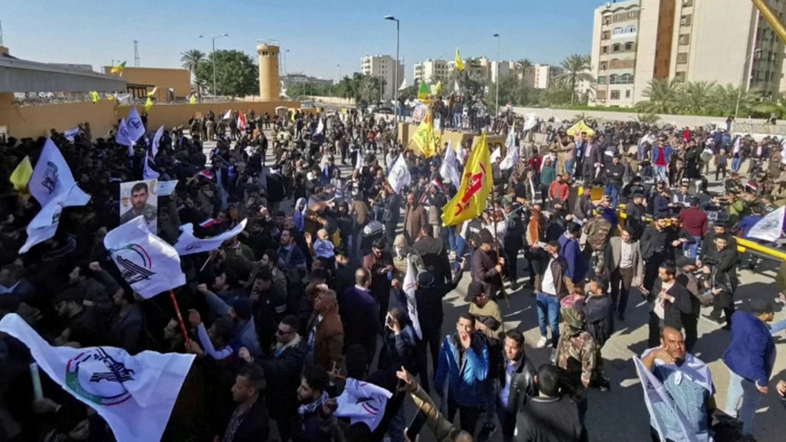 Iraq: Protesters shout 'death to America!' as they storm US embassy in ...