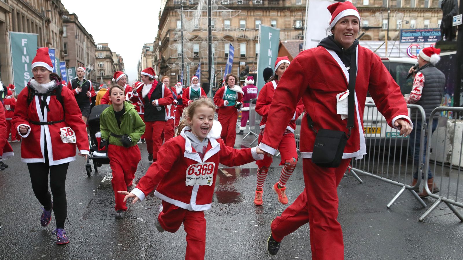 Thousands take part in biggest ever Santa Run in London | UK News | Sky ...