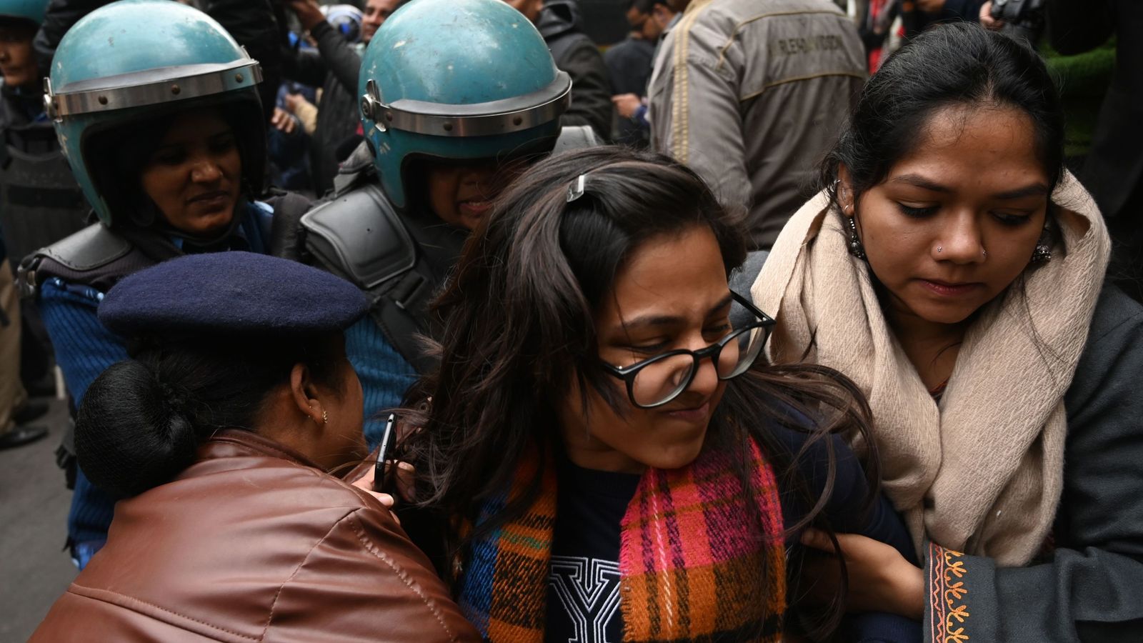 India: Three die in protests as 1,200 arrested over 'bigoted' law ...