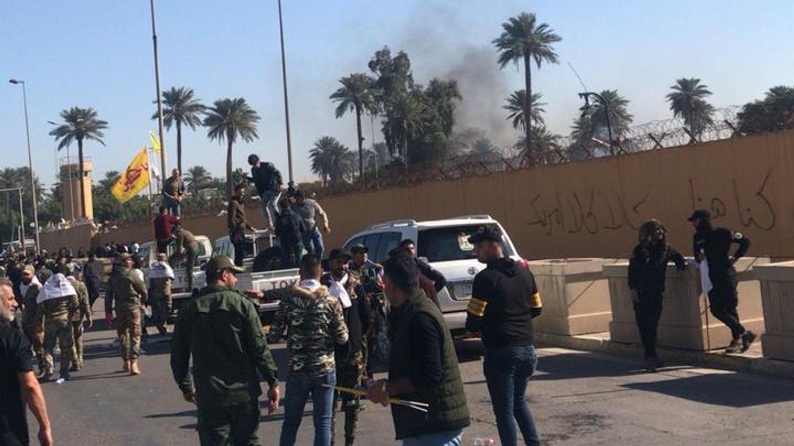 Iraq: Protesters shout 'death to America!' as they storm US embassy in ...