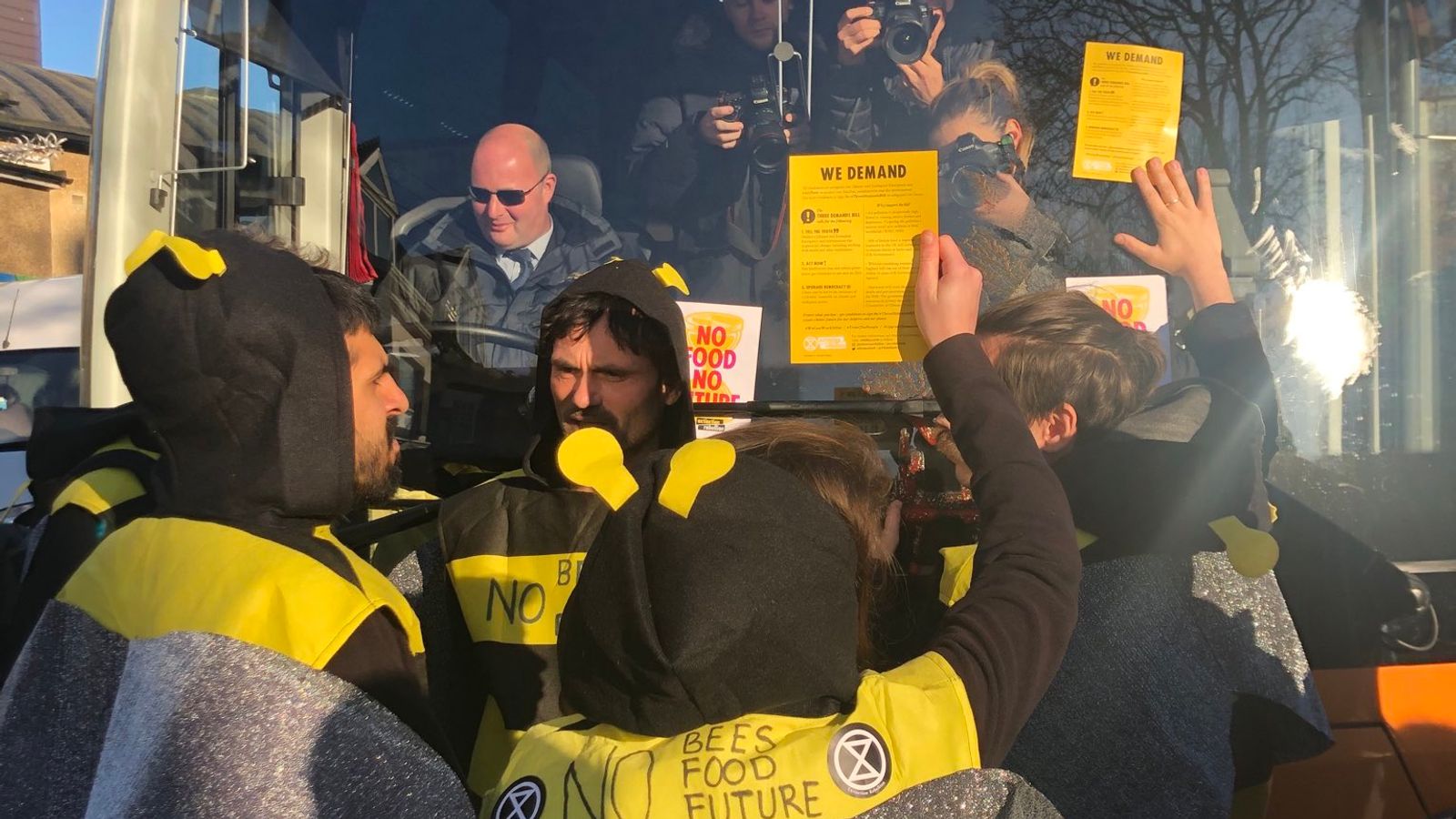 General election: Extinction Rebellion protesters glued to Lib Dem ...