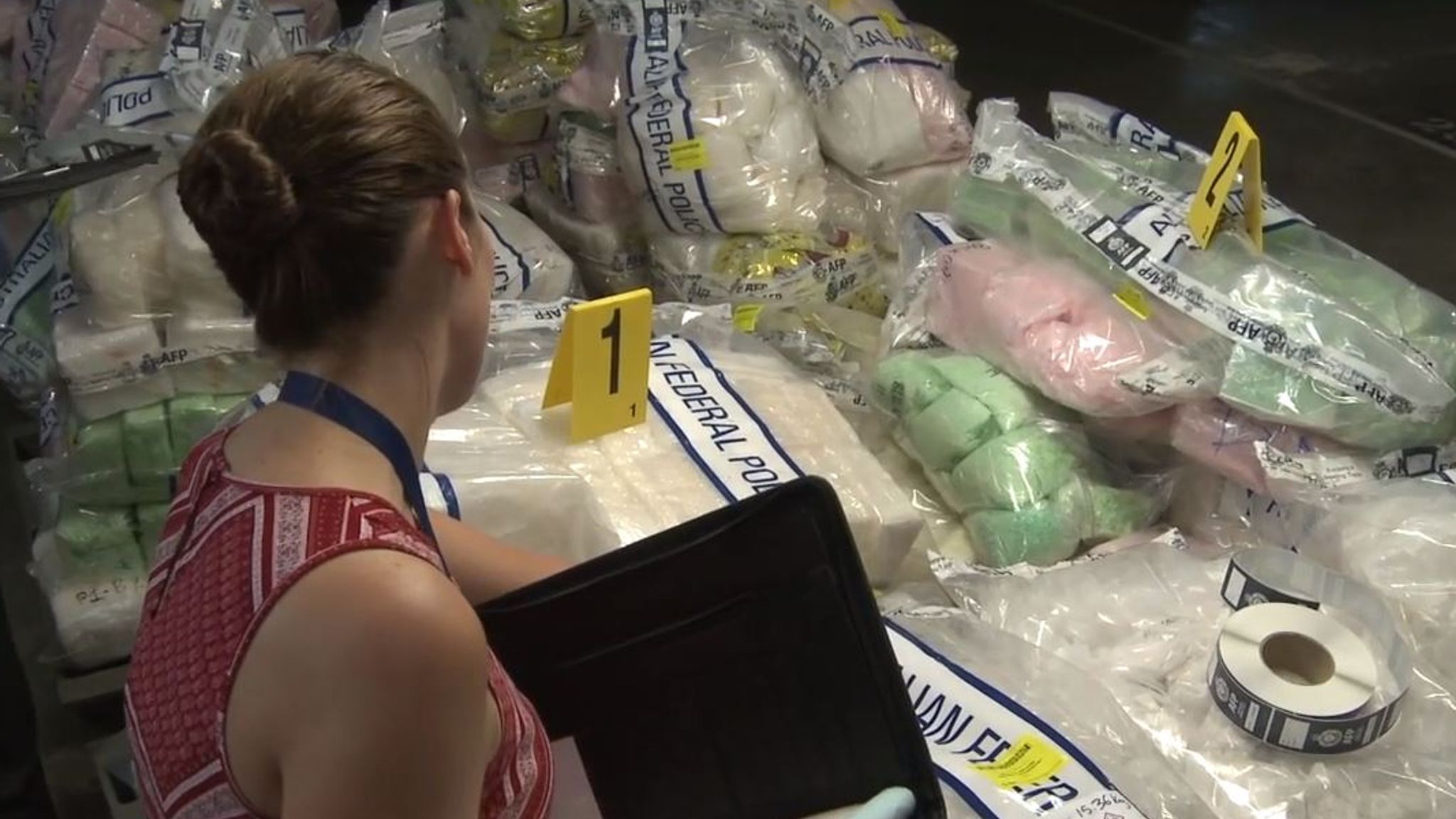 Australia: Two customs agents charged over country's largest crystal ...