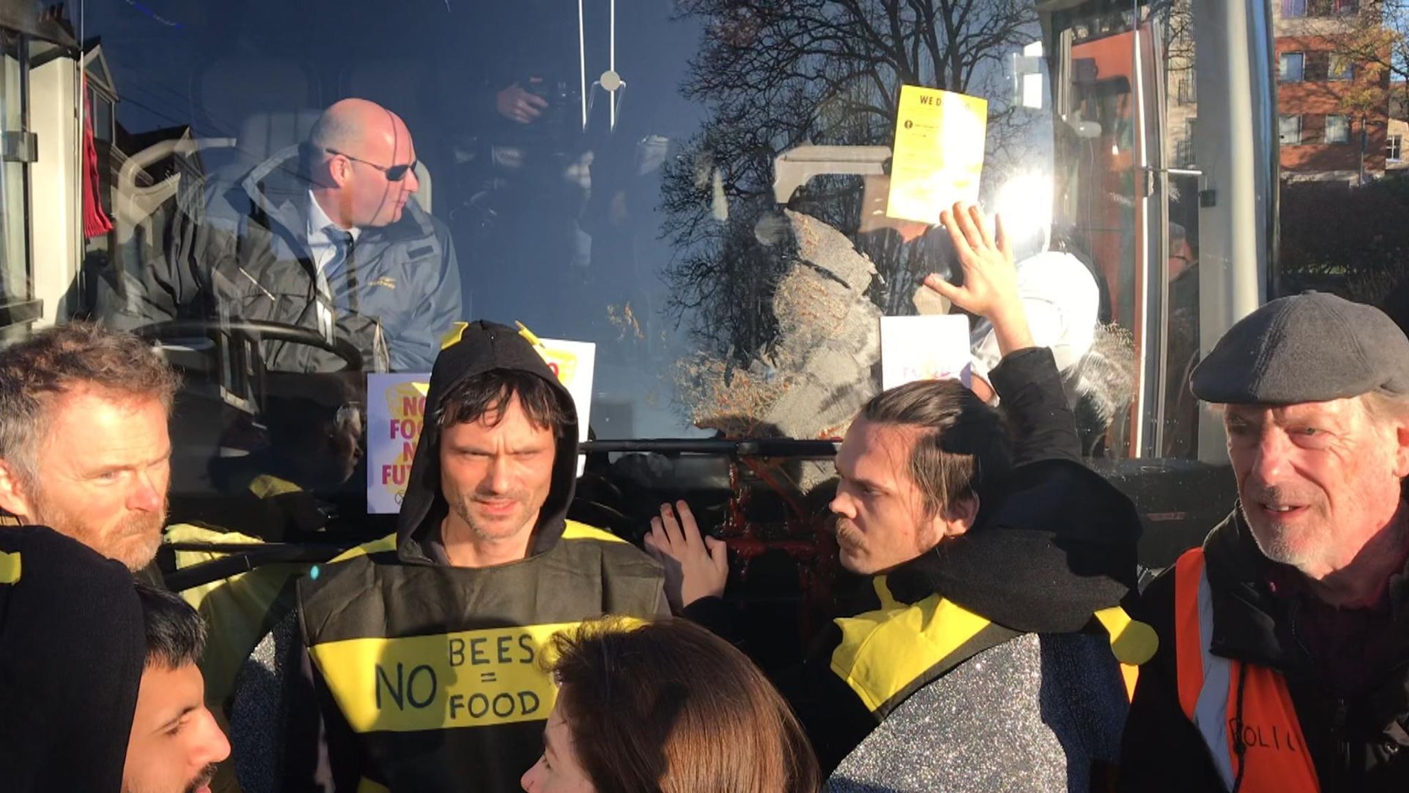 General election: Extinction Rebellion protesters glue themselves to ...