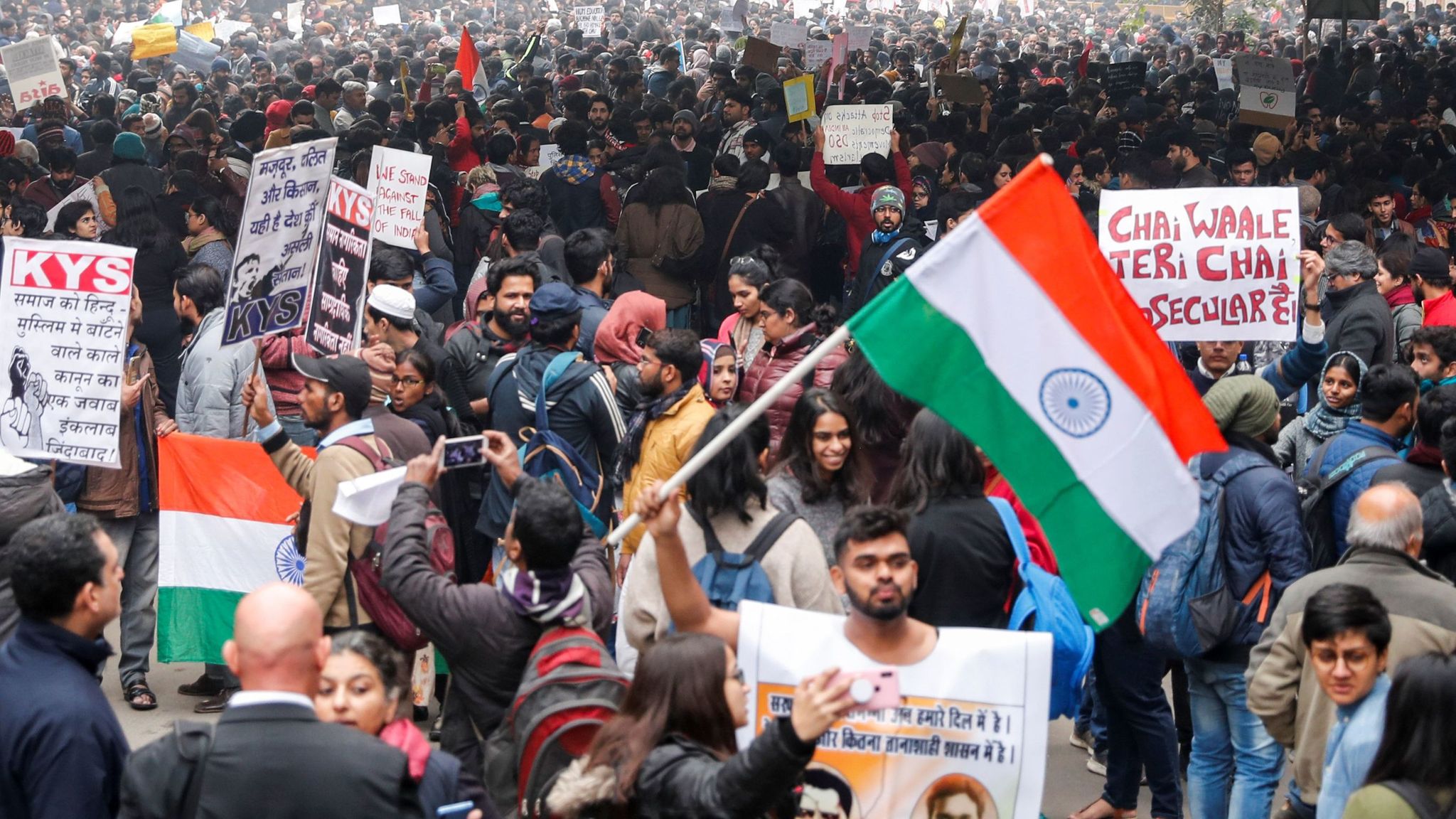 India: Three die in protests as 1,200 arrested over 'bigoted' law ...