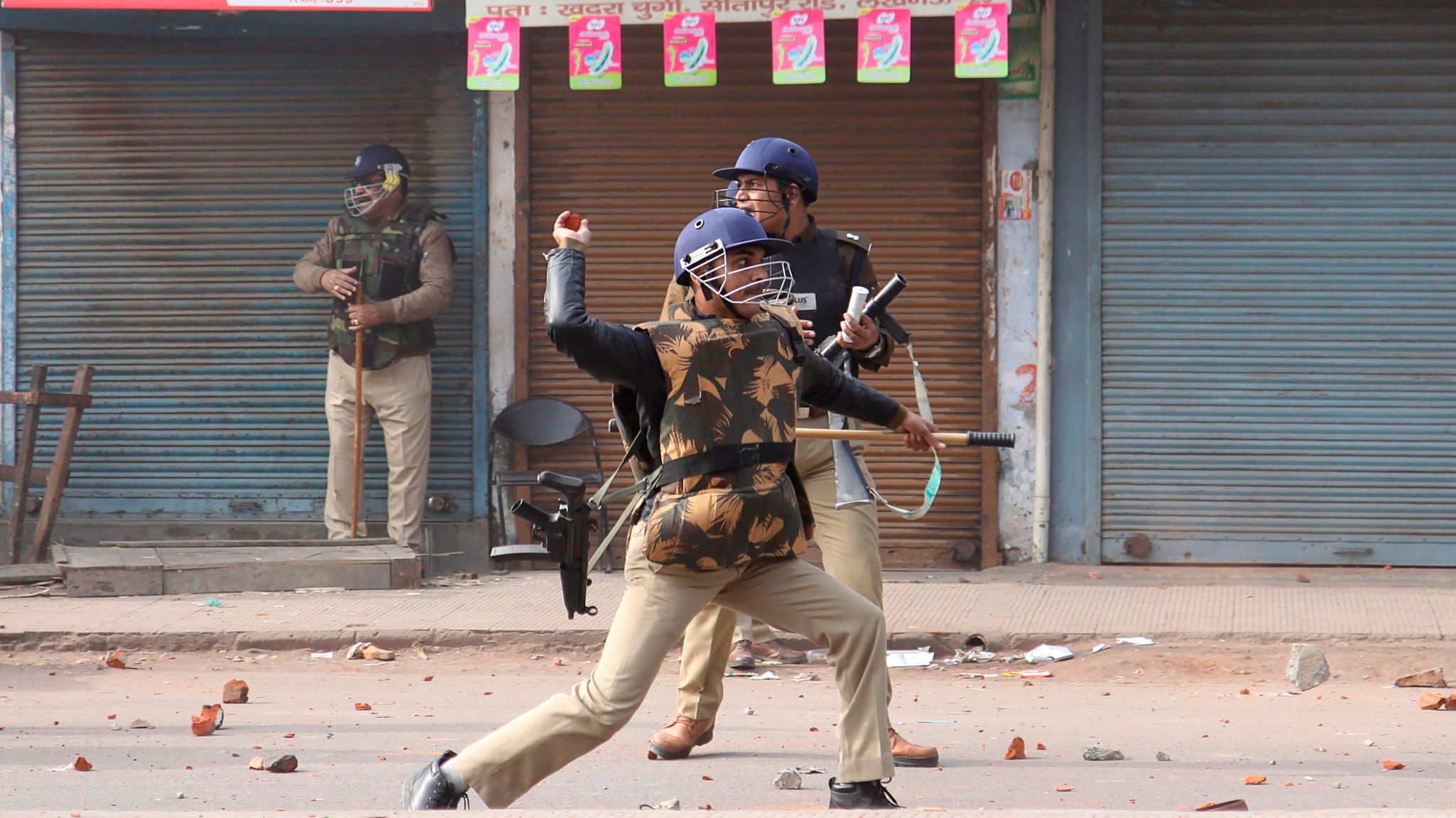 India: Three die in protests as 1,200 arrested over 'bigoted' law ...