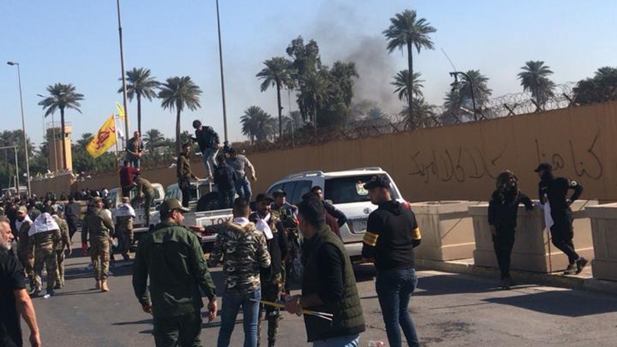 Iraq: Protesters shout 'death to America!' as they storm US embassy in ...