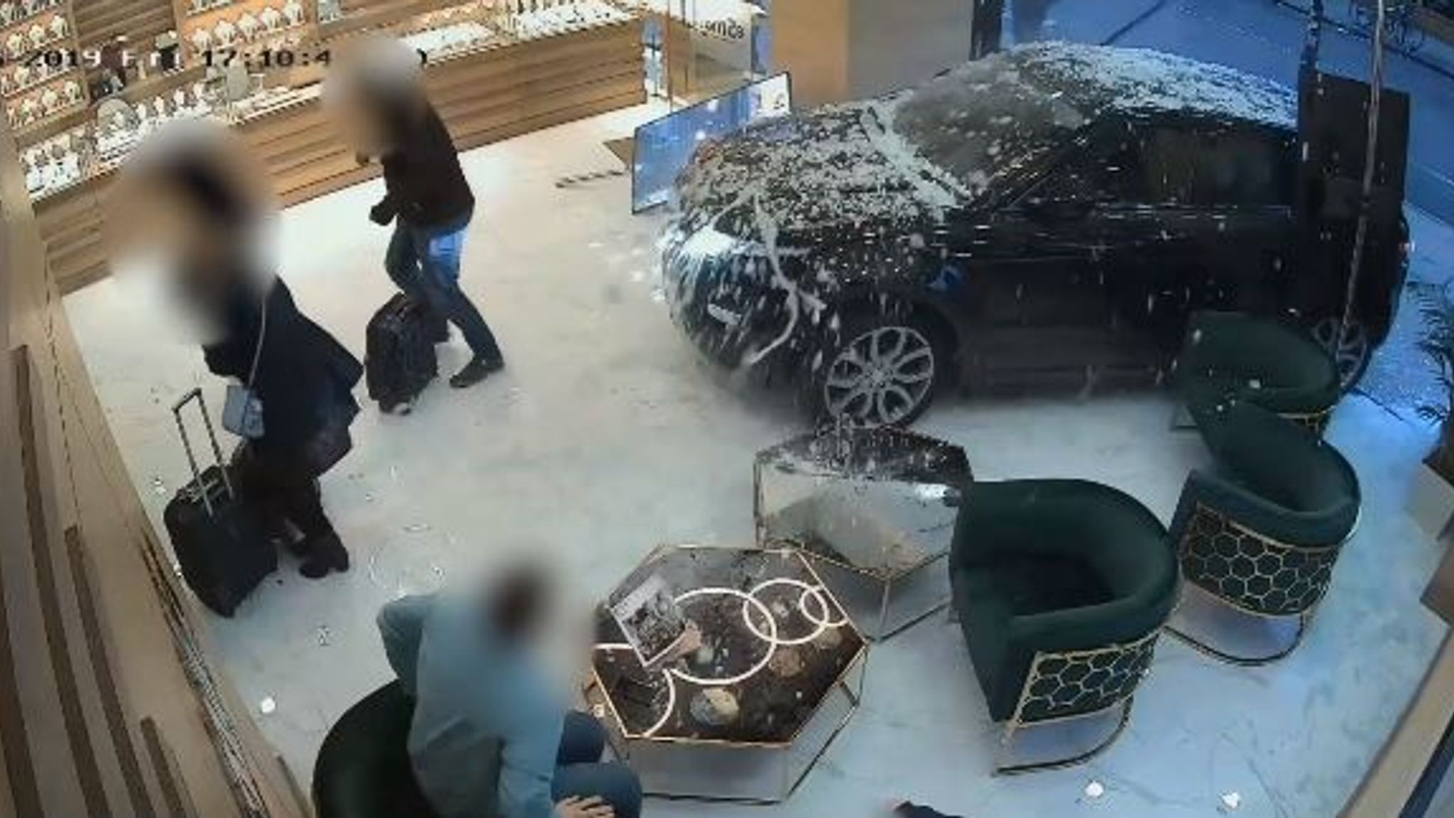 Jewellery robber jailed after public held him down during smash-and ...