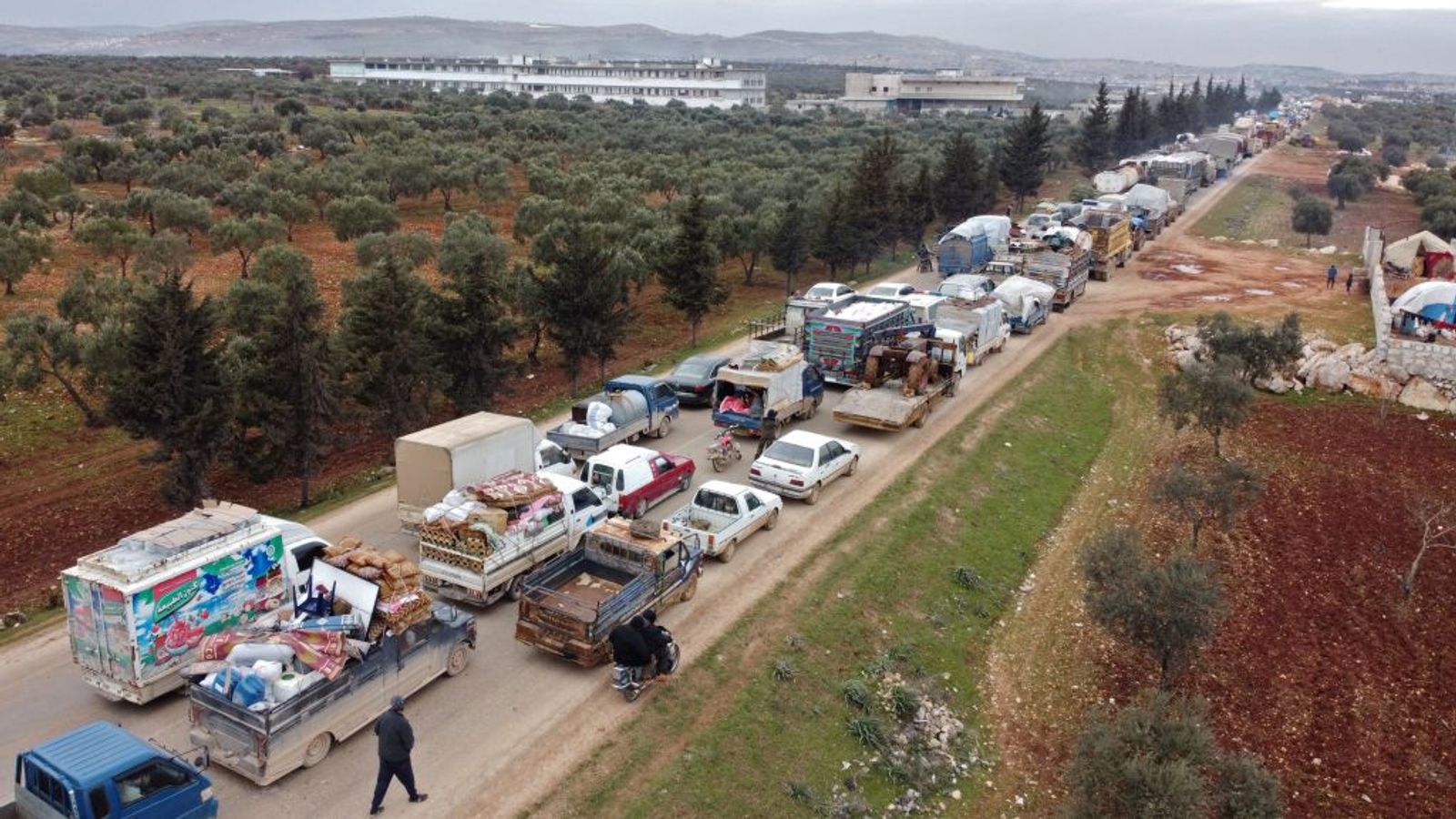 Syria: Children saved from airstrike as Assad forces make final push in ...