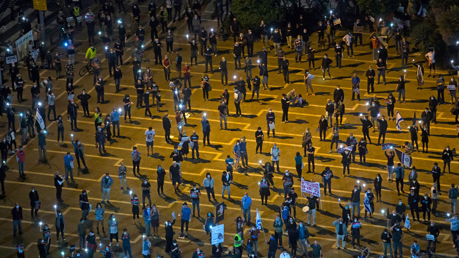 Coronavirus: Israelis follow social distancing in protest | World News ...