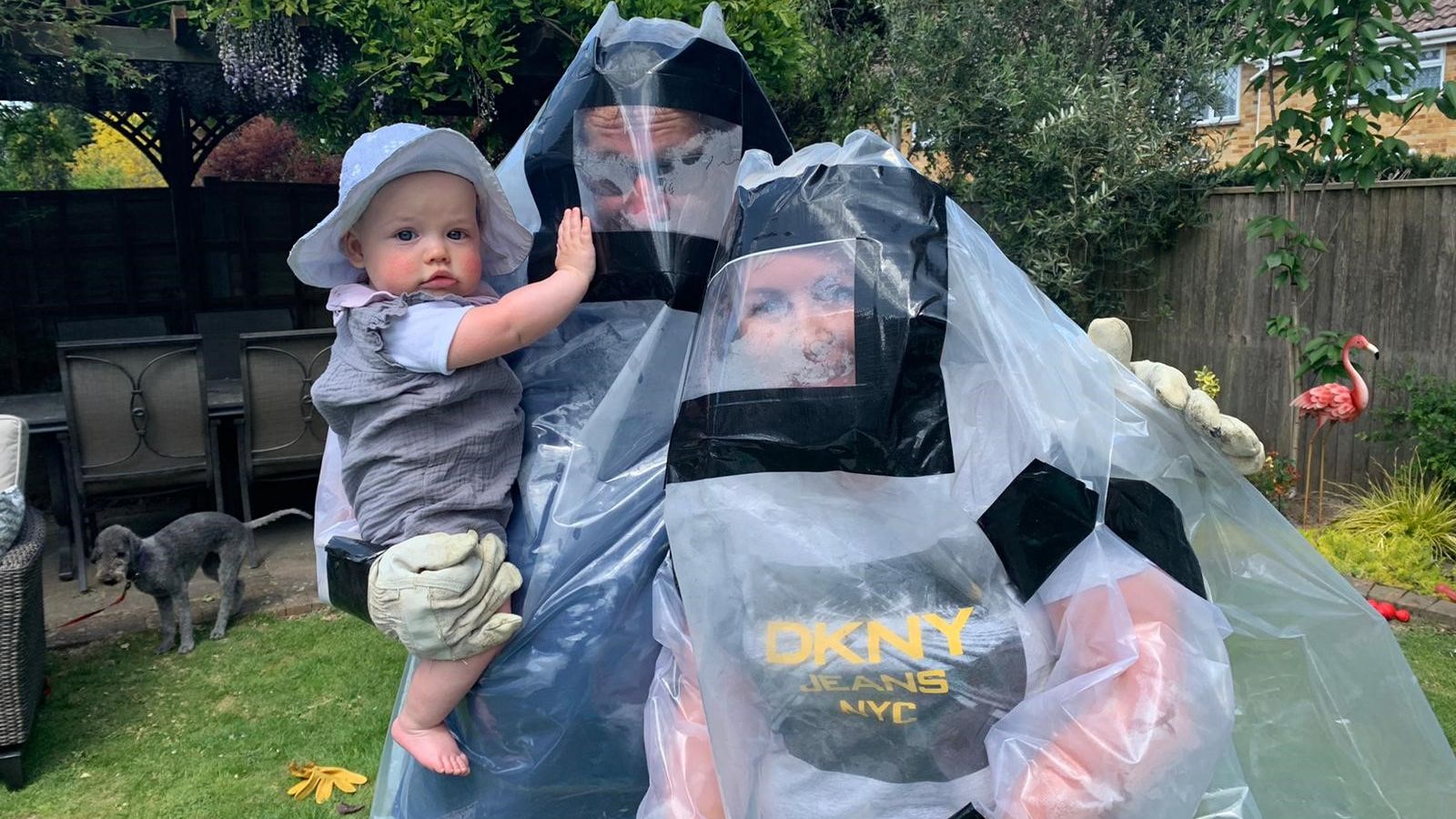 Coronavirus: Couple create 'hugging suit' to see grandchildren during ...
